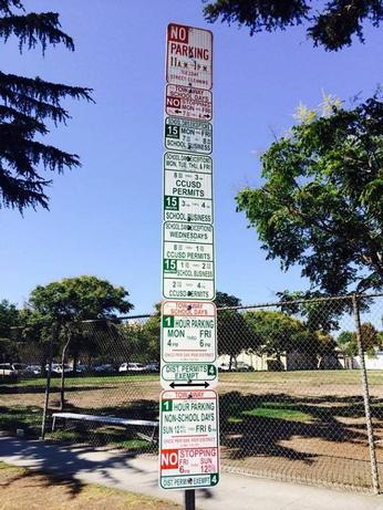 The 15-foot tall parking sign