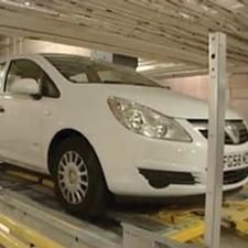 Robots shuffle cars at The Cube